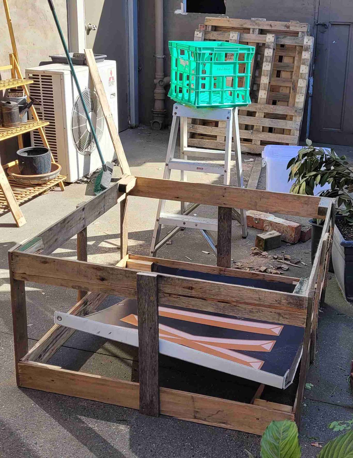 Planter boxes using corflute and milk crates - Mitch's Notes